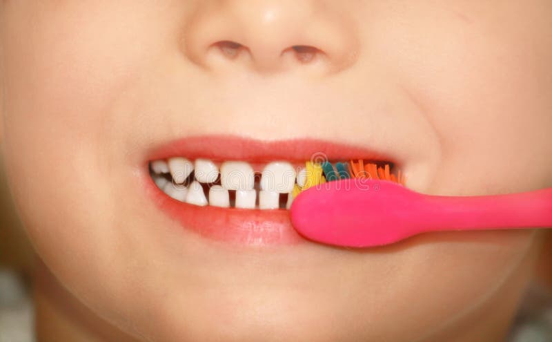 Kid is cleaning teeth stock photo. Image of anatomy, close - 23947686