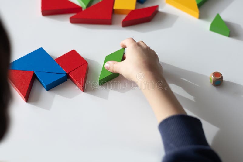 Kid Composing Figures with Colorful Wooden Blocks on White Table ...