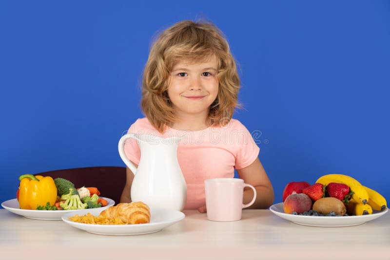 Kid with Dairy Milk. Child with Milk is Poured from a Jug into a Glass ...