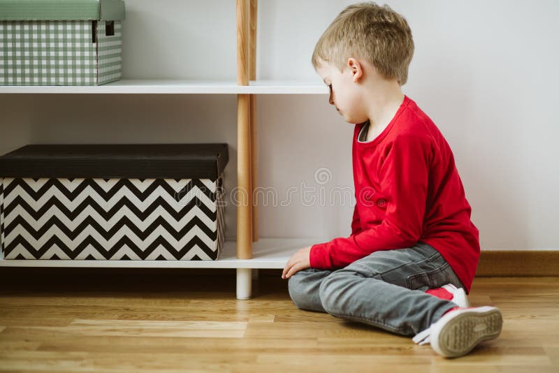 Kid with Depression Sits in the Corner of the Room, and Lose Interest ...
