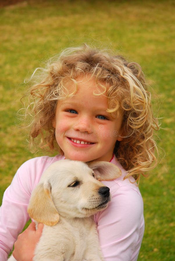 Kid with dog stock image. Image of blond, backyard, breed - 6849299