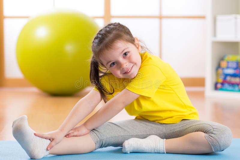 Kid Doing Fitness Exercises Stock Photo - Image of enjoying, baby: 85618854