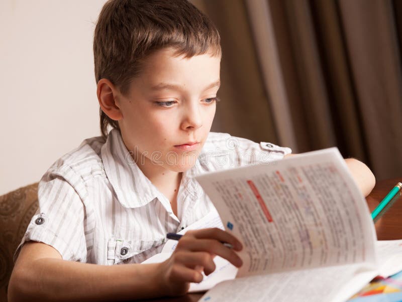 Kid doing homework stock photo. Image of homework, teenagers - 59317602