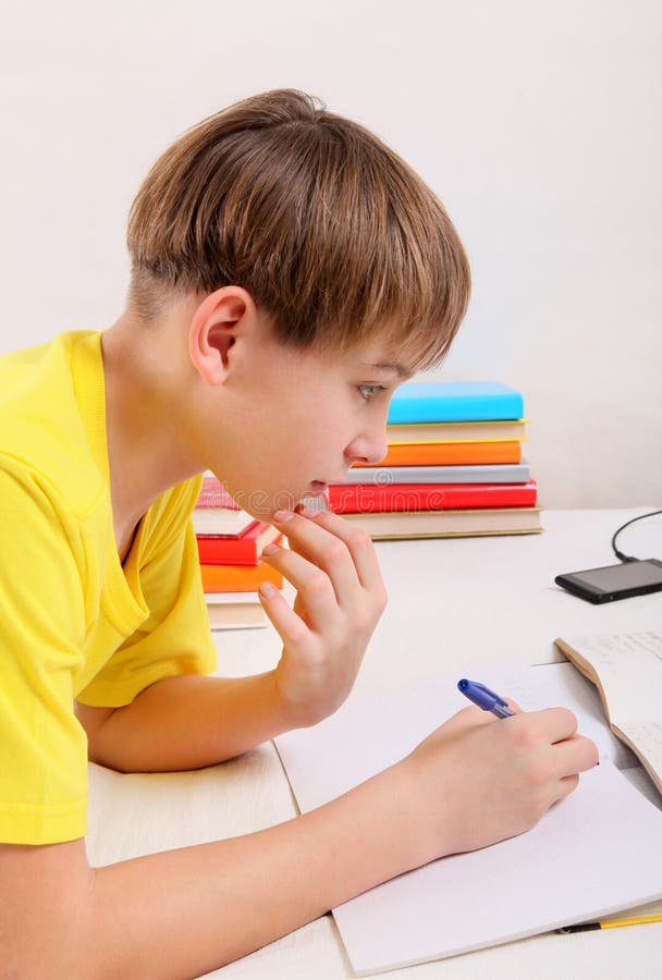 Kid doing Homework stock image. Image of childhood, glasses - 63451441