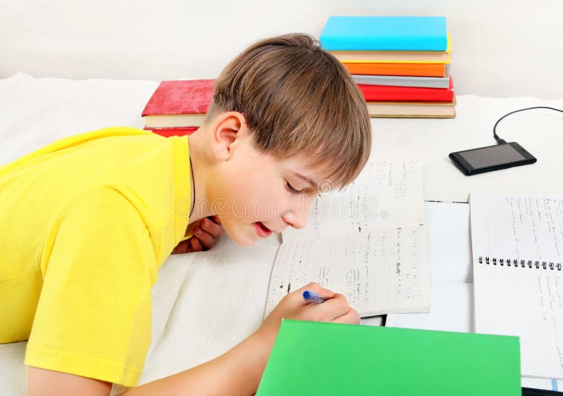 Kid doing Homework stock photo. Image of education, concentration ...