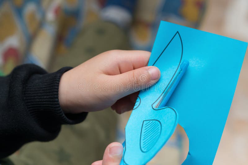 Kid doing paper cutting stock image. Image of creative - 90078149