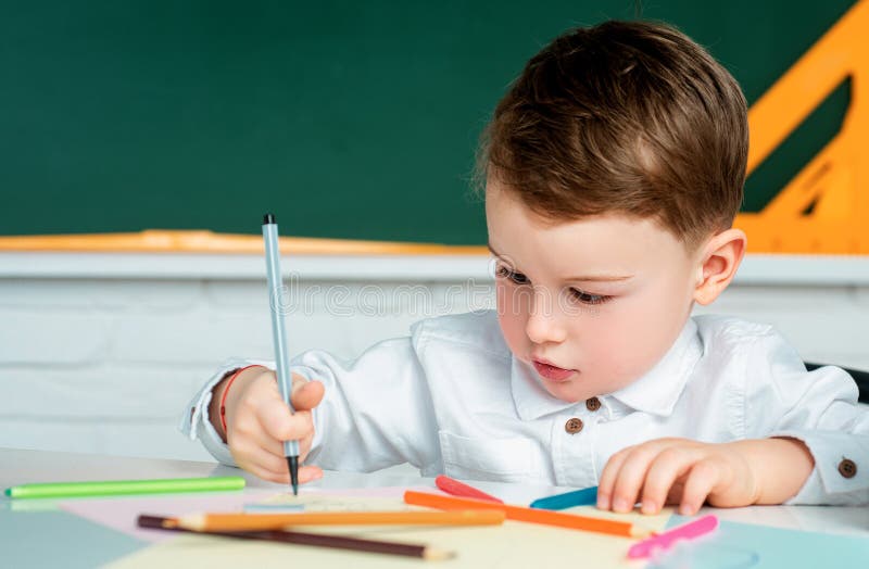 Kid Drawing on Paper. Children Home Learning. Child from Elementary ...