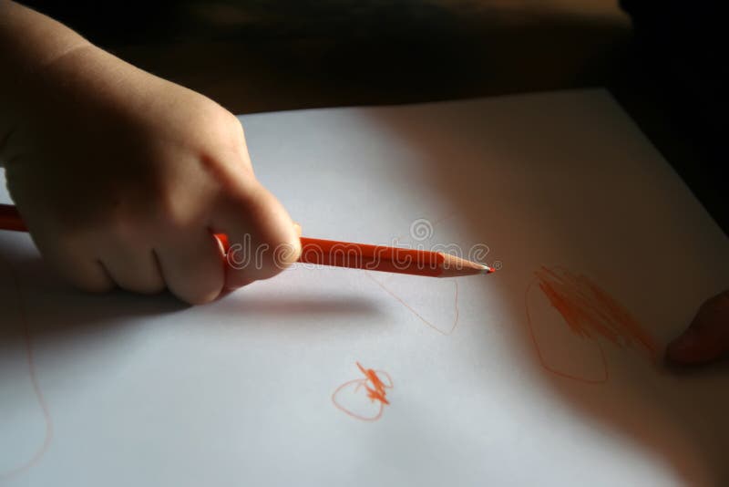 Kid Drawing. Kid Sketching. Child Drawing with Crayons Stock Photo ...