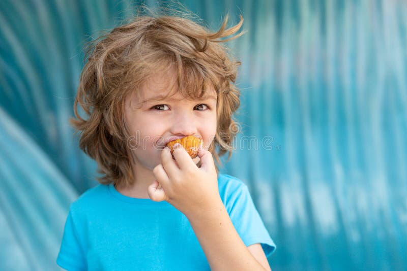 Kid Eating Cookies Outdoors. Child Eats Biscuit. Kids Lunch. Stock ...