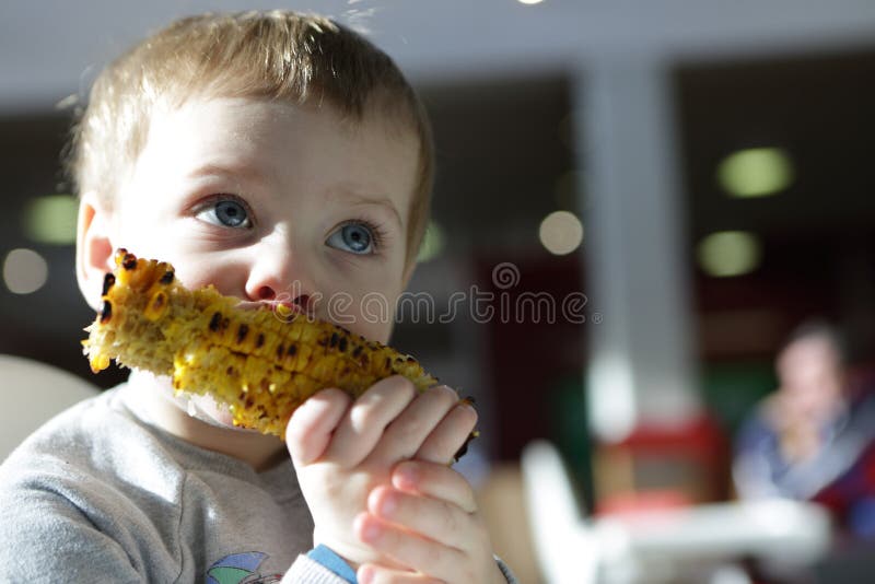 Kid Eating Grilled Cob Corn Stock Image - Image of child, cute: 88348213