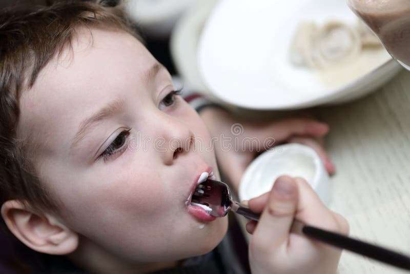 Kid Eating Meat Dumplings with Sour Cream Stock Image - Image of ...