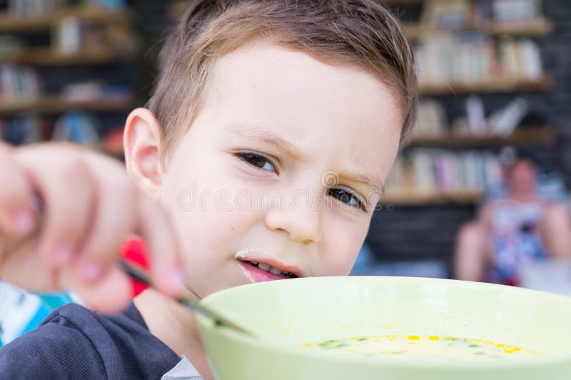 Kid eating soup stock photo. Image of issues, lunch, wipe - 43799190