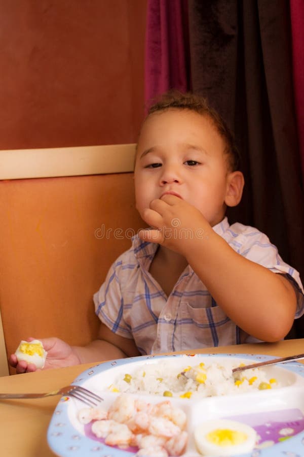 Kid eats. stock image. Image of breakfast, happy, fresh - 43864819