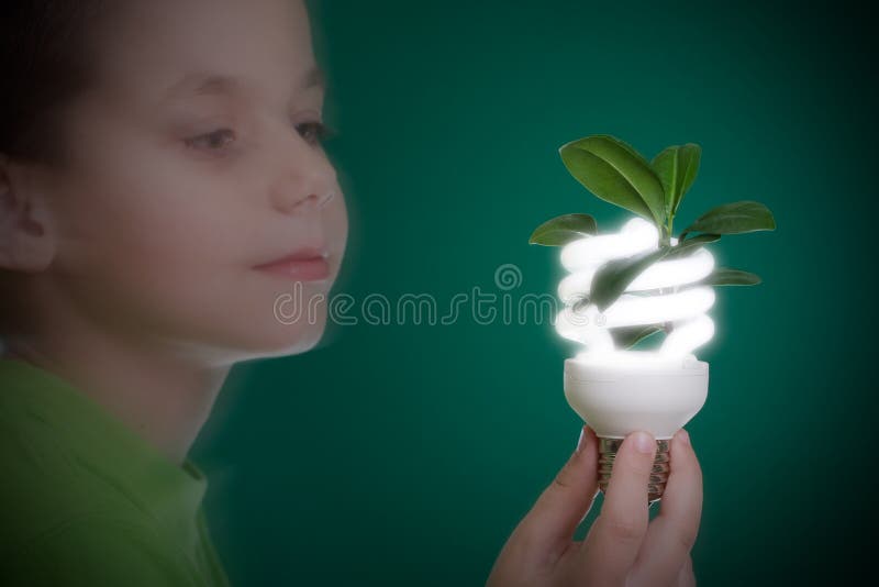 Kid with Energy Saving Bulb Stock Image - Image of innovation, green ...