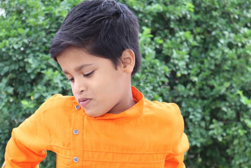 A kid expression of shy stock image. Image of people - 254296465