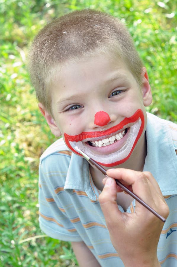 Kid face mask paint stock photo. Image of humor, lips - 19631954