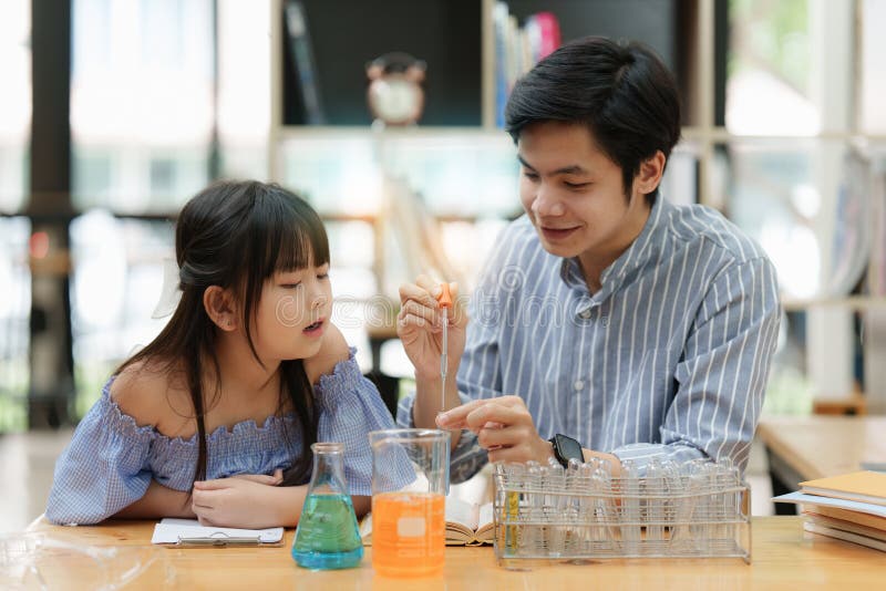 Kid and Father Doing Science Experiments. Education Science Concept ...