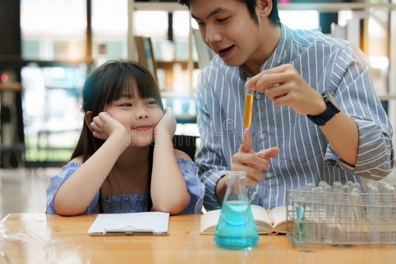 Kid and Father Doing Science Experiments. Education Science Concept ...