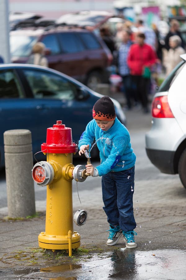 Kid by a fire editorial stock image. Image of lightpole - 51086394