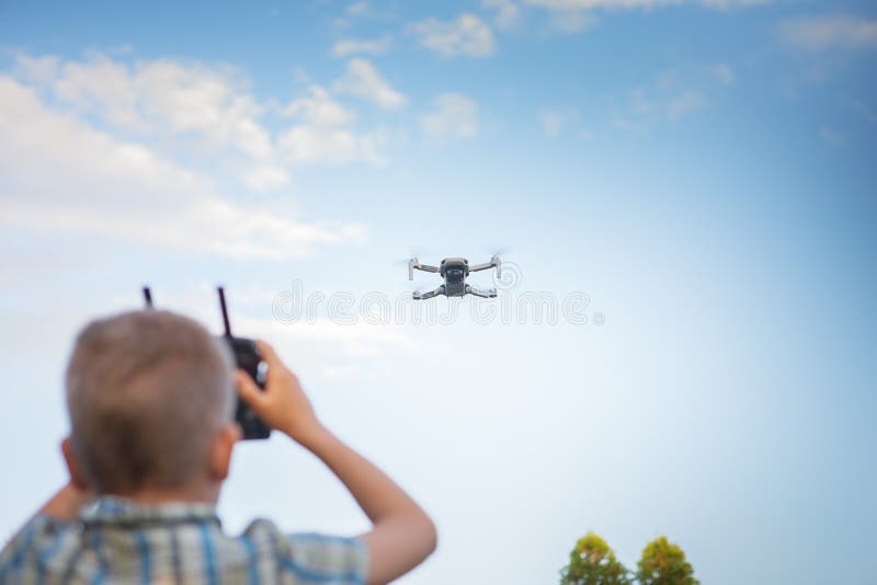 Kid Flying Drone. Boy Operate Drones Stock Image - Image of electronics ...