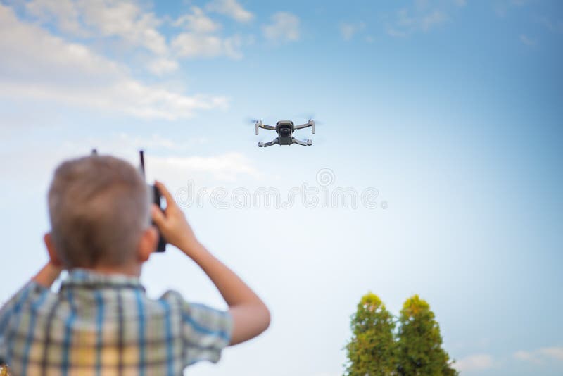 Kid Flying Drone. Boy Operate Drones Stock Photo - Image of equipment ...