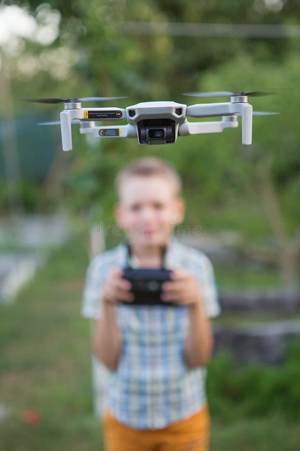 Kid Flying Drone. Boy Operate Drones Stock Photo - Image of processing ...