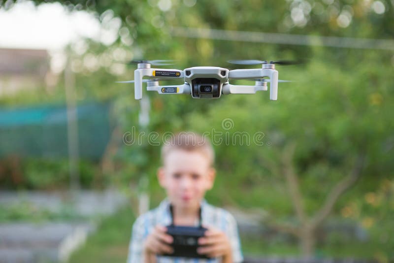 Kid Flying Drone. Boy Operate Drones Stock Photo - Image of equipment ...
