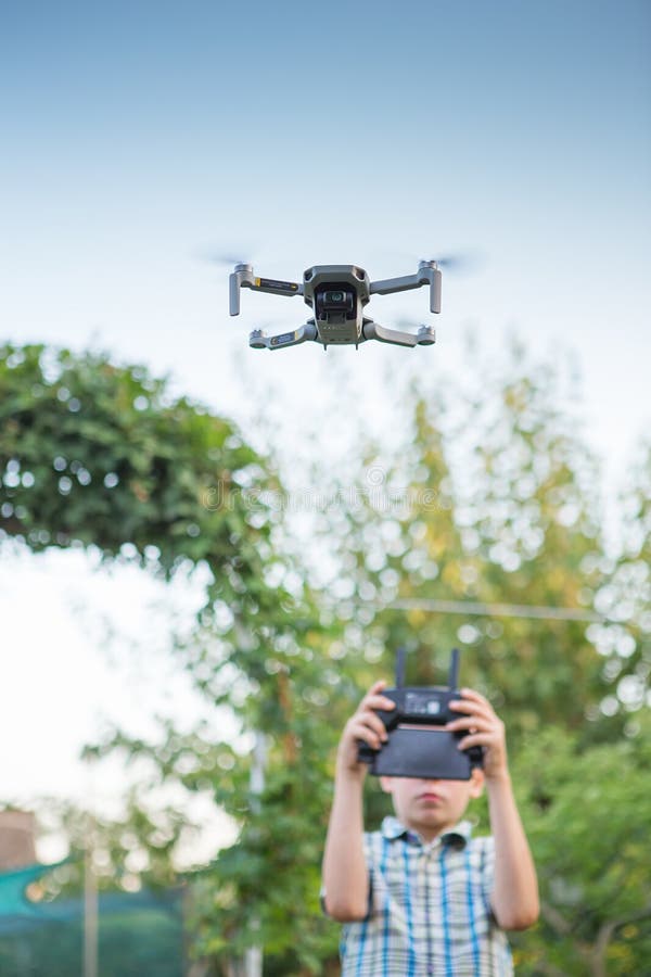 Kid Flying Drone. Boy Operate Drones Stock Image - Image of object ...