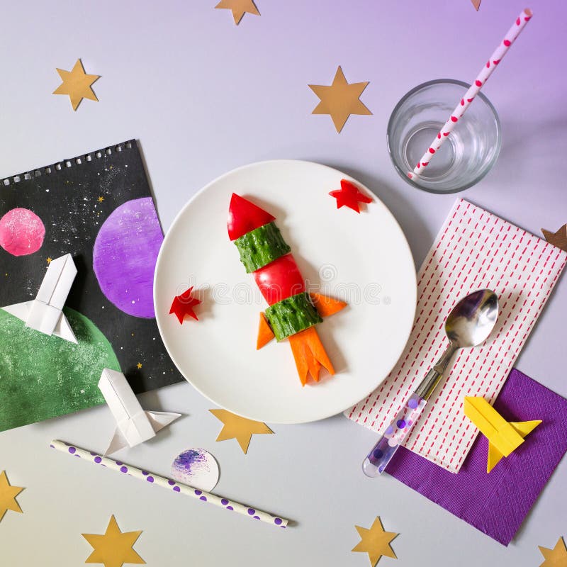 Kid Food. Children`s Plate with a Rocket of Vegetables. Space Breakfast ...