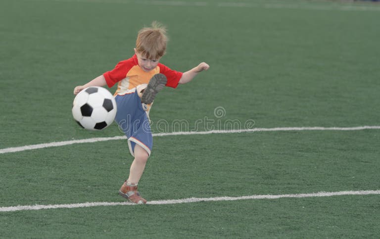The kid - football player stock image. Image of sports - 7498801