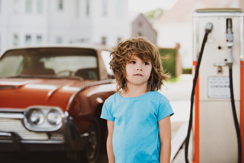 Retro Gas Station. Smiling Kid Boy at the Gas Station. Waiting for Fuel ...