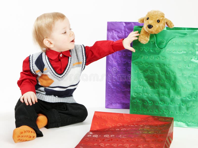 Kid gets a toy stock image. Image of growth, package, baby - 4490051