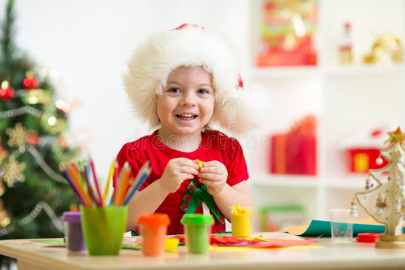 Kid Girl Making by Hands X-mas Decorations Stock Photo - Image of ...