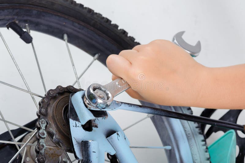 Fixing Gear on Bicycle with Pliers Stock Photo - Image of tyre, fixing ...