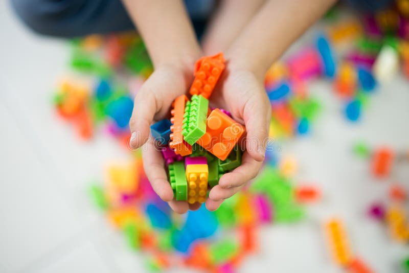 Kid Hand Holding Blocks Toy Close Up Stock Image - Image of design ...