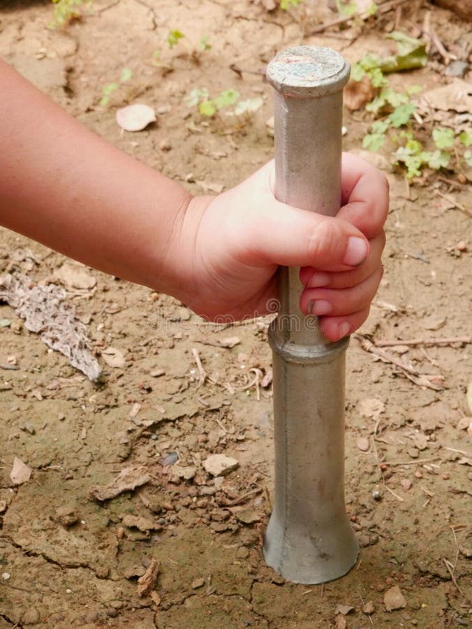 Kid Hand Holding Iron Construction Tools Stock Photo - Image of kids ...