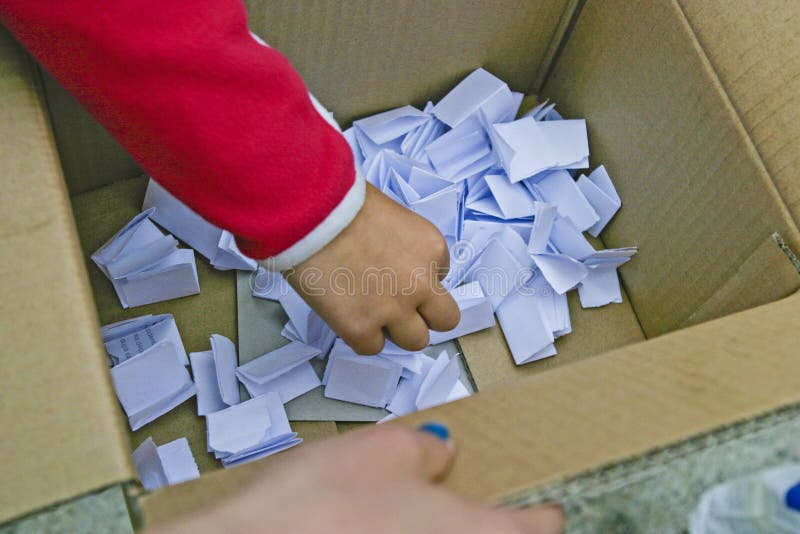 Kid Hand Picking a Raffle Ticket Stock Photo - Image of mixed, raffle ...
