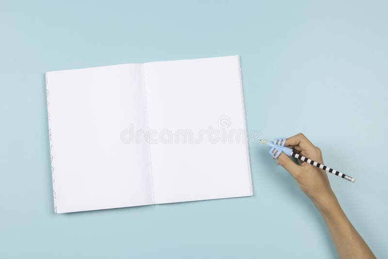 Kid Hand Using Pencil with Silicone Three Finger Pen. Top View To Hand ...