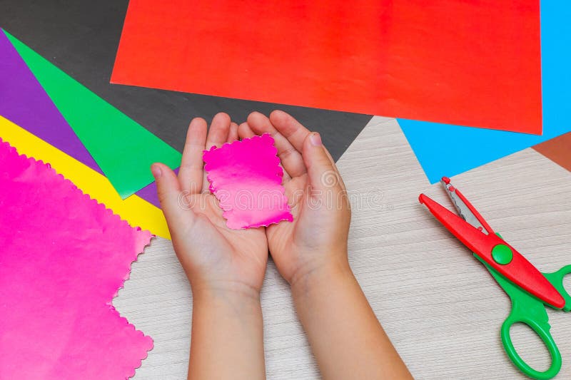 Kid Hands Cutting Colored Paper with Scissors. Education, Learning ...