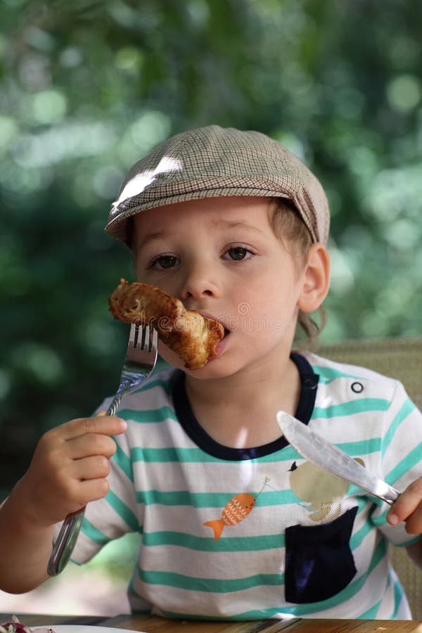 111 Kid Eating Chicken Leg Stock Photos - Free & Royalty-Free Stock ...