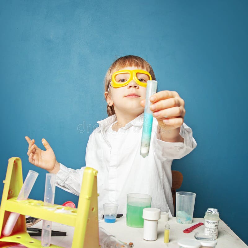 Kid Having Fun Making an Experiment at a Science Centre. Child Girl and ...