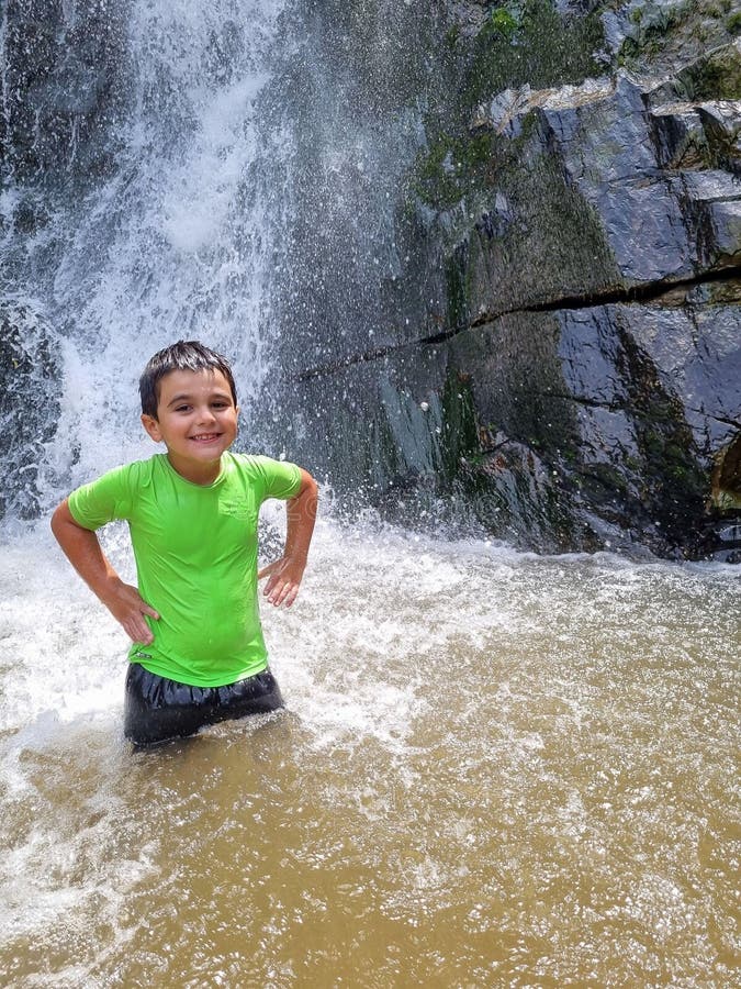 Kid Having a Refreshing Waterfall Bath Stock Image - Image of shower ...