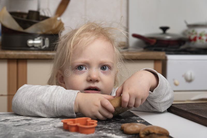 Kid Helps Mom Make Cookies. Cooking Cookies with Children Stock Image ...