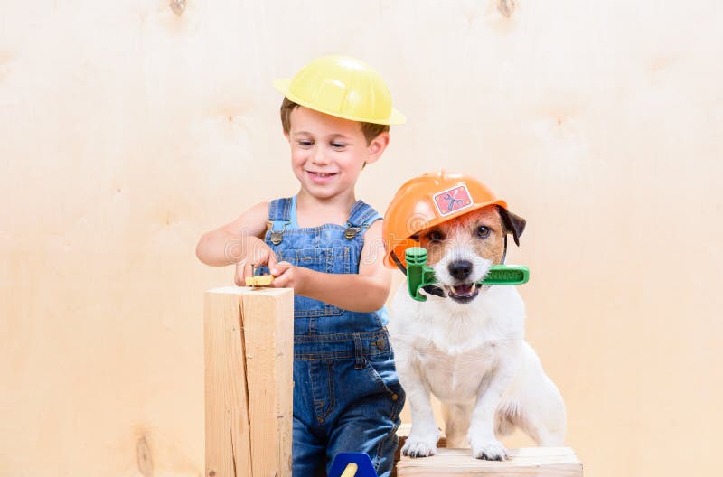 Kid and His Pet at Construction Site Working As Builders Stock Photo ...
