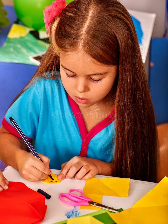 Kid Holding Colored Paper on Table in Kindergarten Stock Photo - Image ...