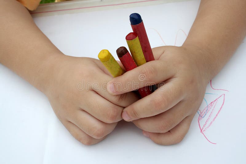 Kid holding crayon stock image. Image of concept, blue - 863021