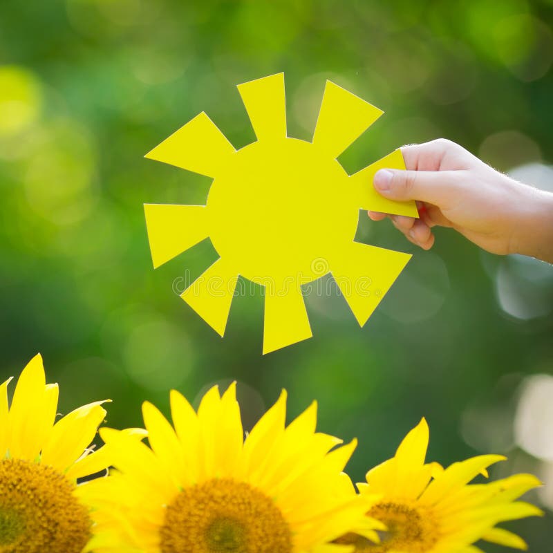 Kid holding paper sun stock image. Image of paper, conceptual - 37135885
