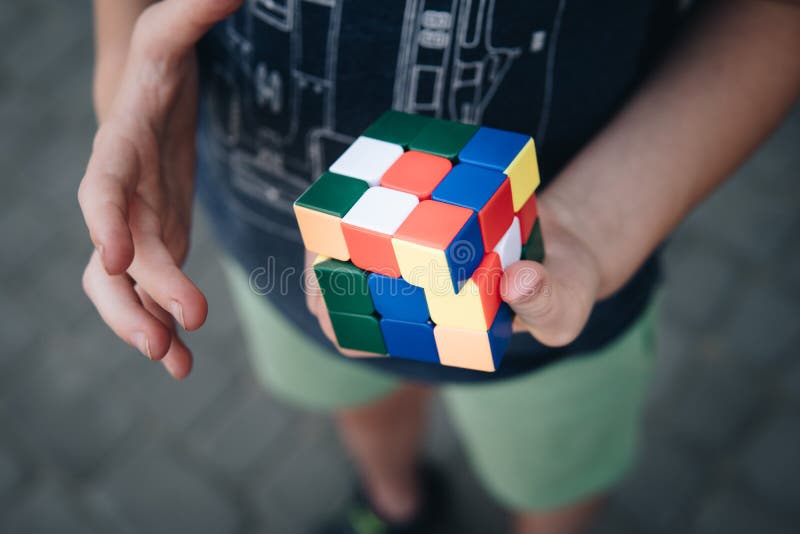 Kid holding rubik cube editorial image. Image of square - 125698930 Kid holding rubik cube editorial image. Image of square - 125698930