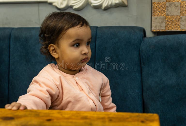 Kid Innocent Face Expression Sitting at Sofa at Night Stock Photo ...