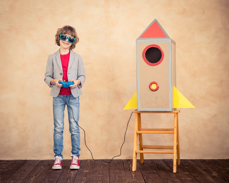 Kid with Jet Pack Playing at Home Stock Photo - Image of protection ...